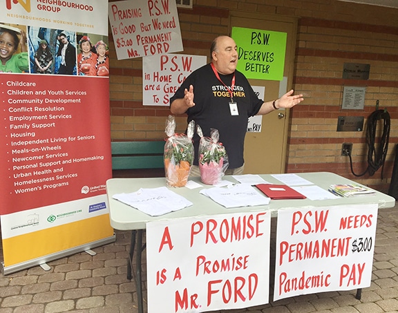 Bill Sinclair of The Neighbourhood Group presented with Frances Lankin ...