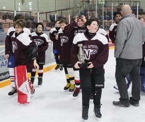 Neil McNeil intramural hockey team celebrates inaugural Vandersteen Cup ...