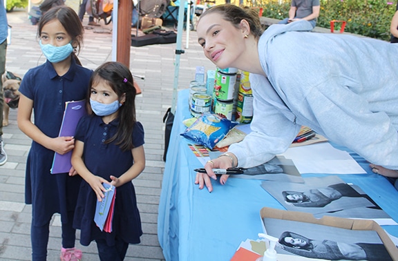 Beach celebrates Olympic medals with Penny Oleksiak at food donation ...